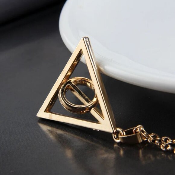Boutique | Jewelry | Gold Deathly Hallows Symbol Fidget Pendant ...